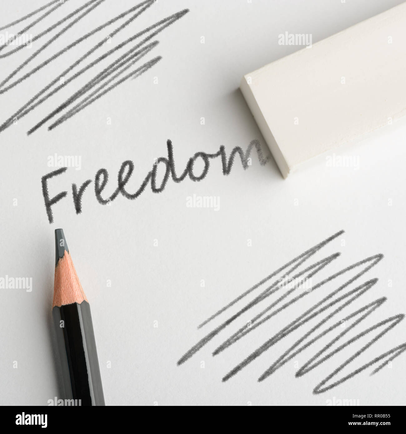 Eraser removing word "Freedom Stock Photo - Alamy