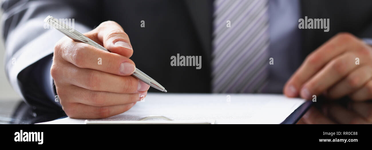 Male arm in suit and tie fill form clipped Stock Photo - Alamy