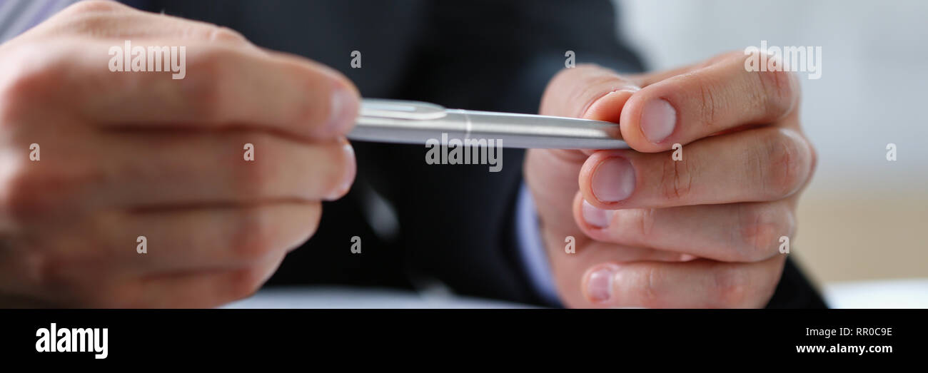Male arm in suit and tie fill form clipped Stock Photo - Alamy