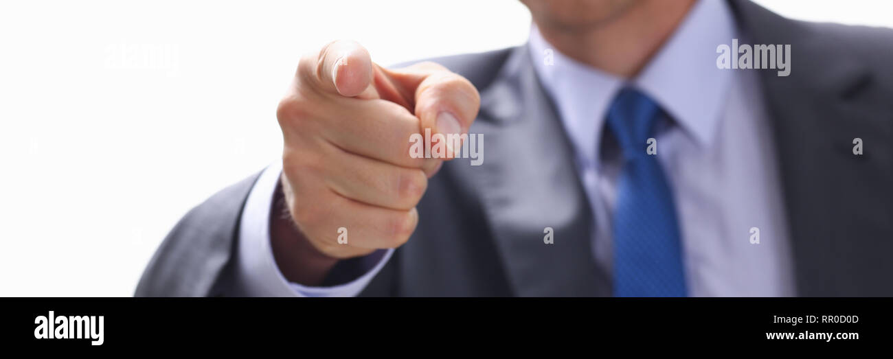 Businessman points a finger at someone who Stock Photo - Alamy