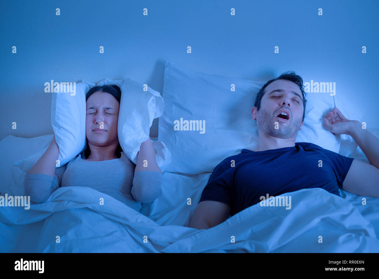 Woman snoring in bed hi-res stock photography and images - Alamy