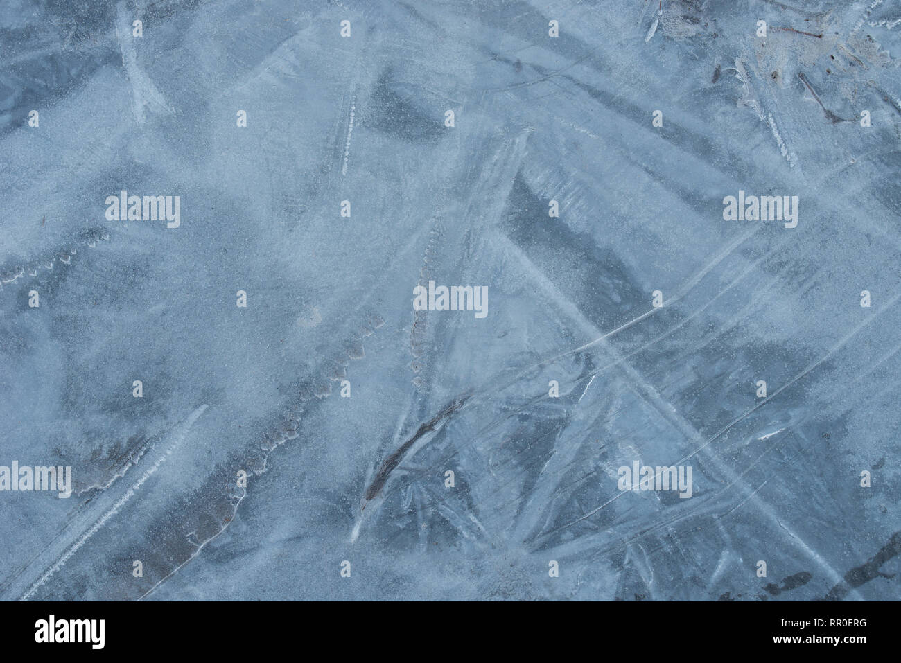 cracked ice on pool background texture macro Stock Photo - Alamy
