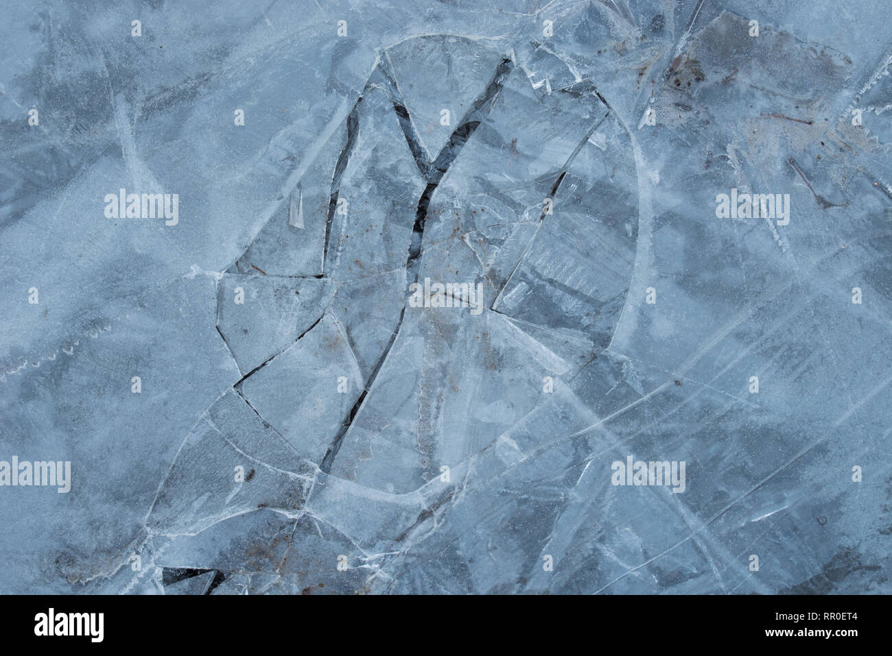 cracked ice on pool background texture macro Stock Photo - Alamy