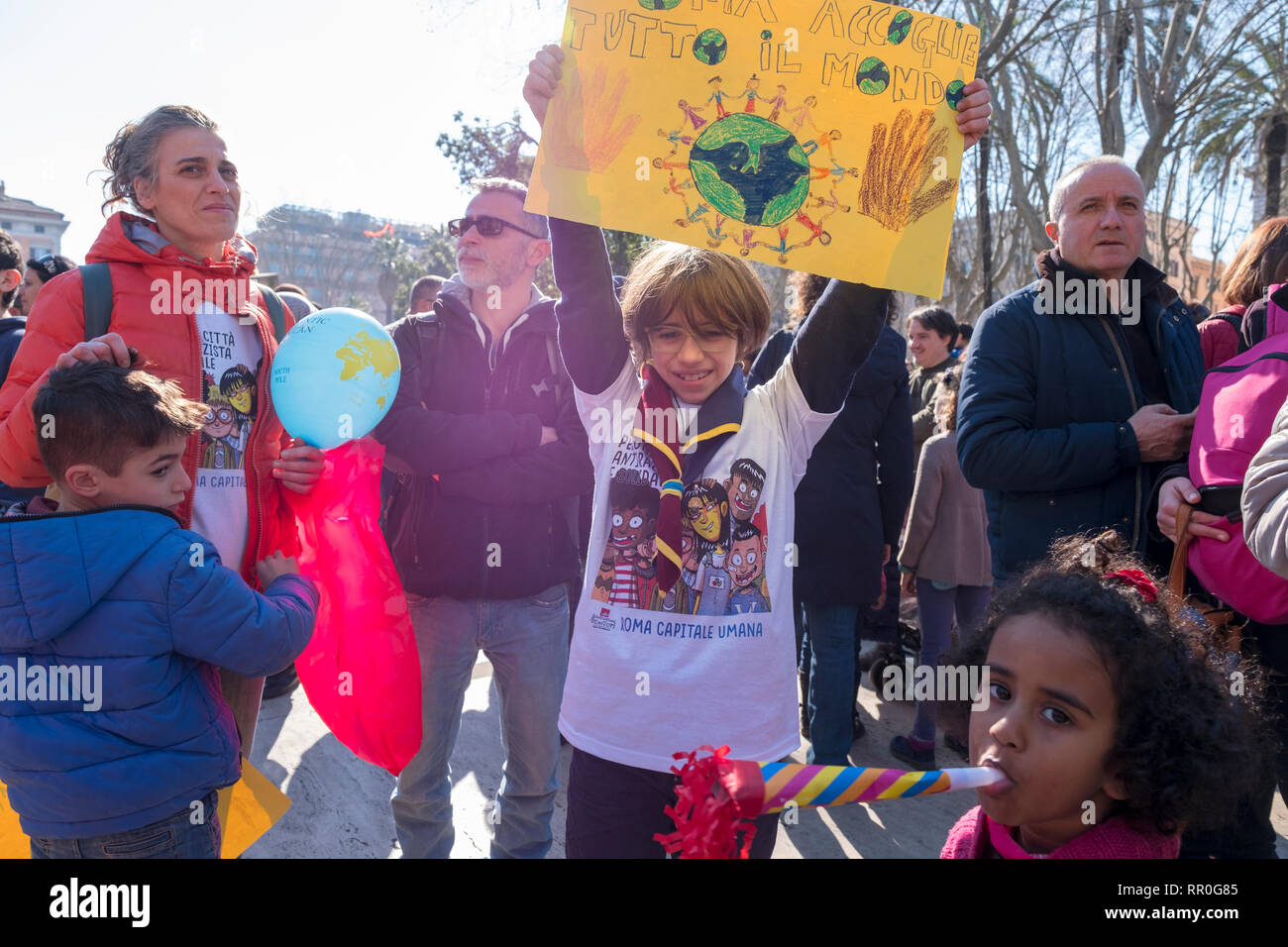 Thousands of people, including families with children, participate in ...
