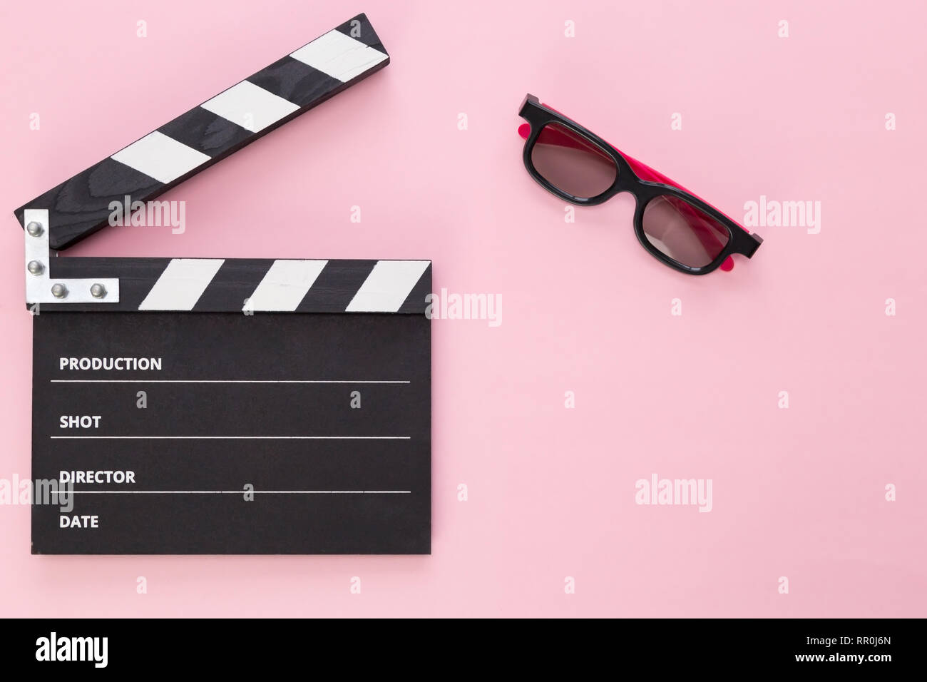black clapperboard isolated on color background, flat lay Stock Photo ...
