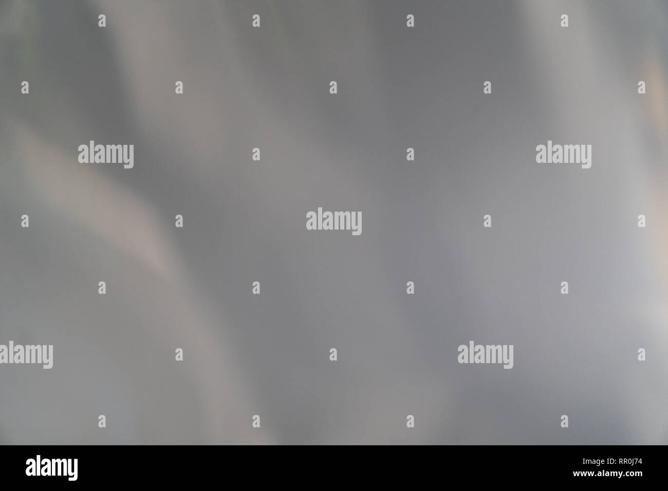 Silver gray slightly wavy background Stock Photo - Alamy