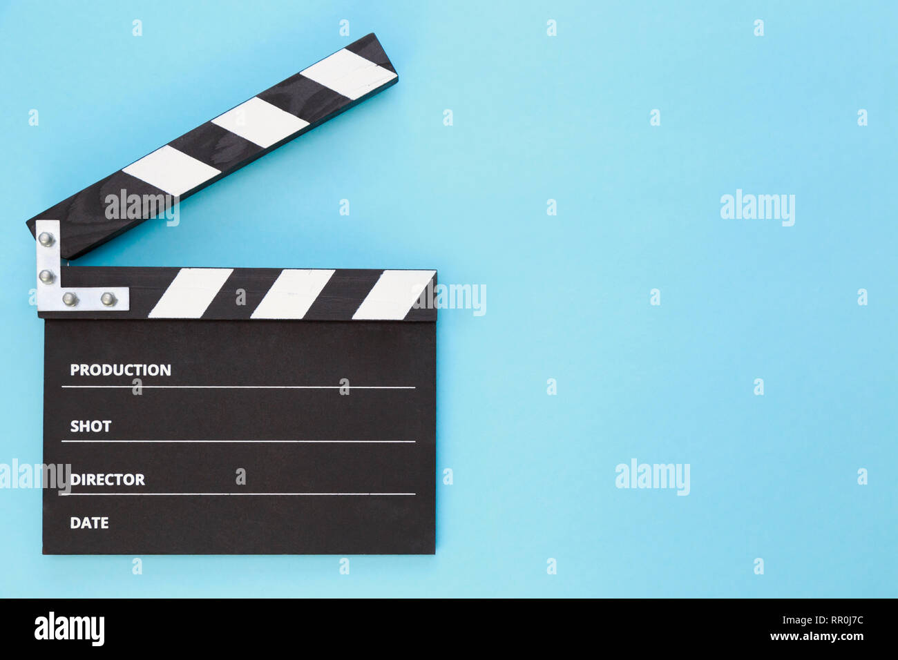 black clapperboard with free space for text isolated on color ...