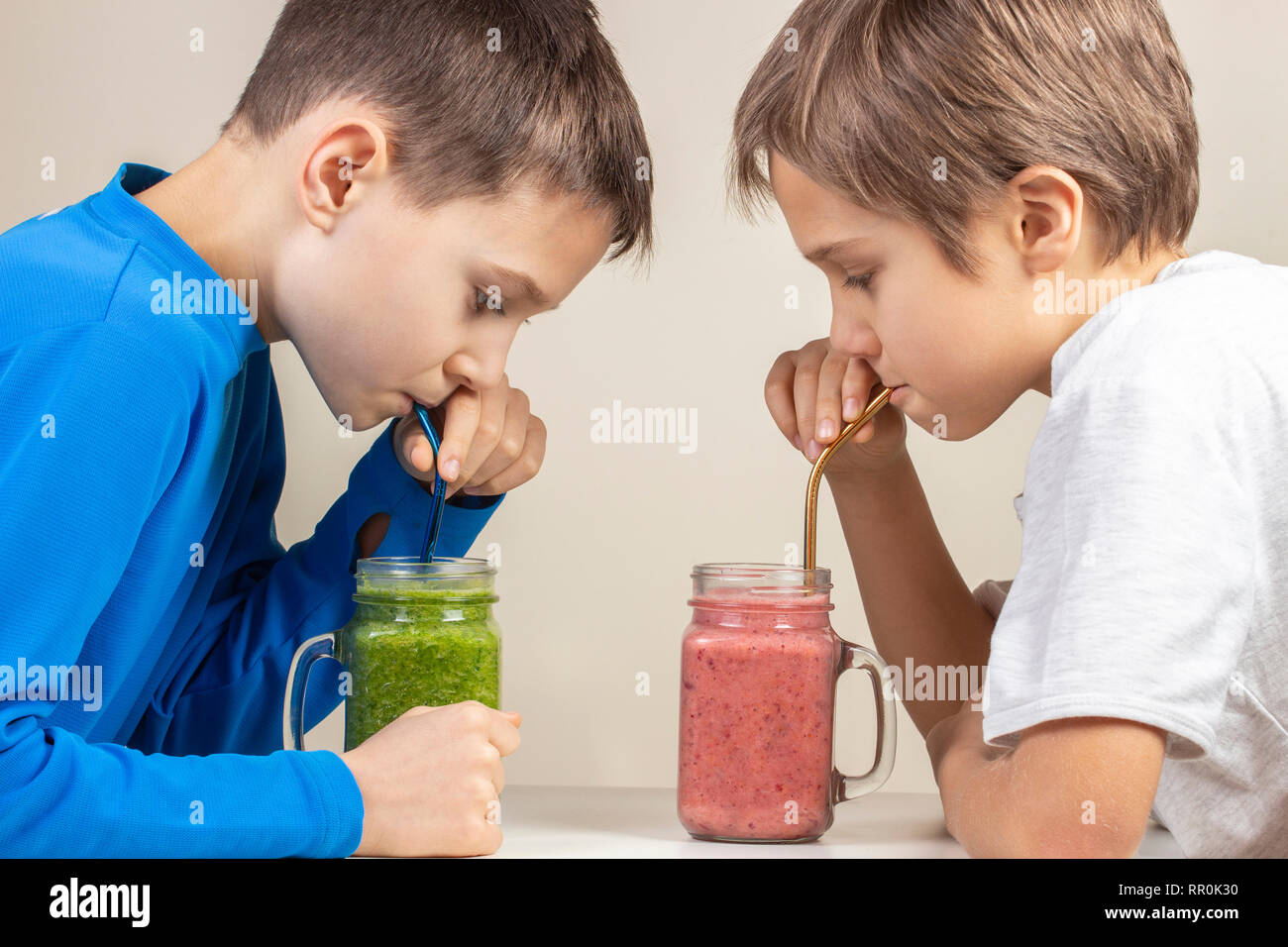 Boys drink hi-res stock photography and images - Alamy