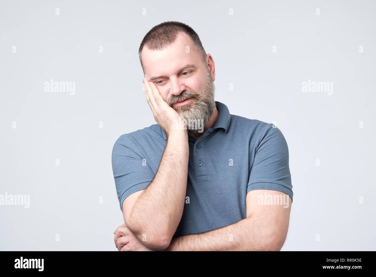 Hand on cheek hi-res stock photography and images - Alamy