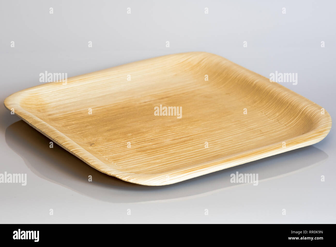 Biodegradable eco friendly tableware showing Plates and Spoons made ...