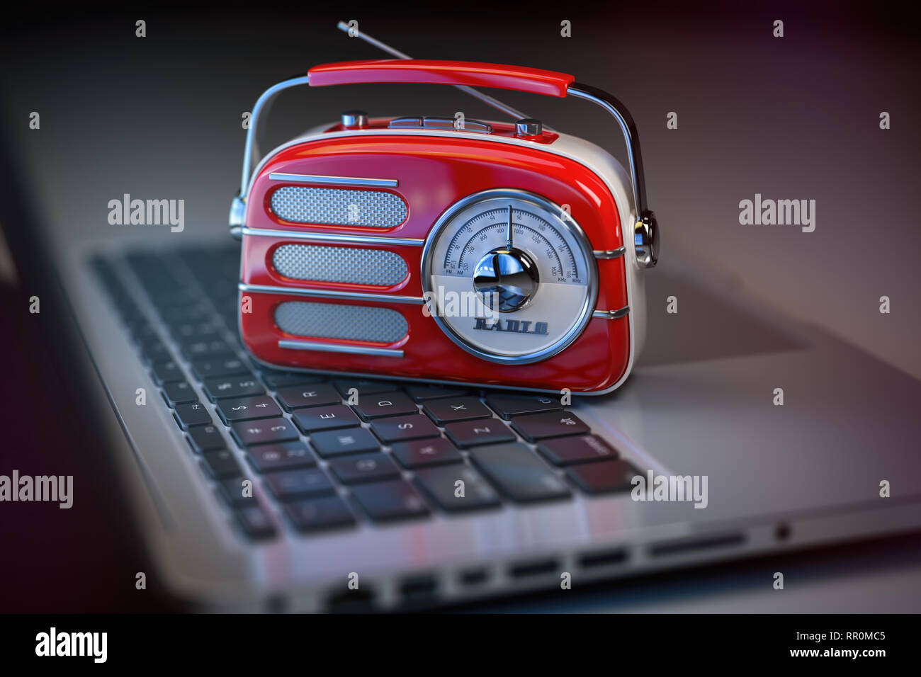 Online radio live. Vintage radio on laptop keyboard. 3d illustration ...
