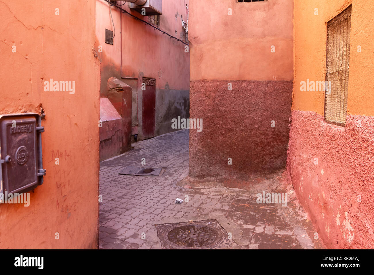 Colorful ancient old and narrow street in medina of Marrakech, Morocco ...