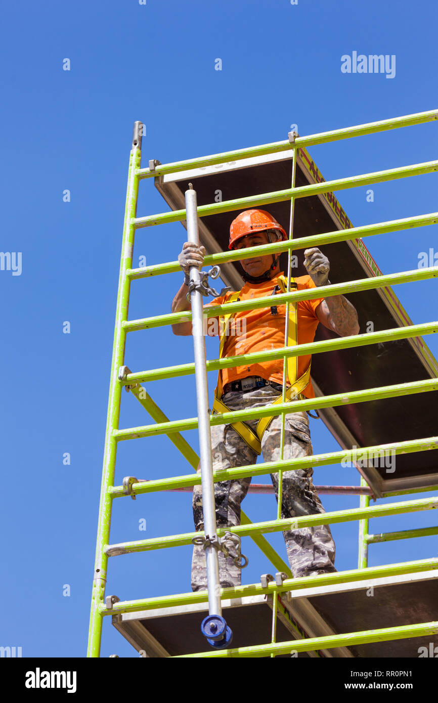 construction workers on a scaffold Stock Photo - Alamy