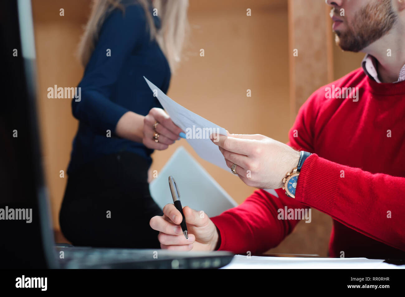 Business office team passing documents hi-res stock photography and ...