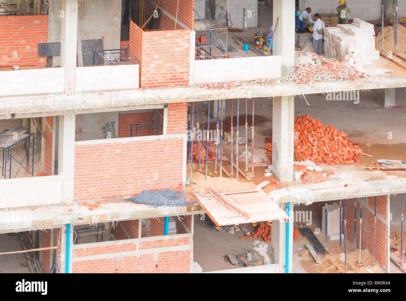 construction workers site and building of housing at laborer work ...