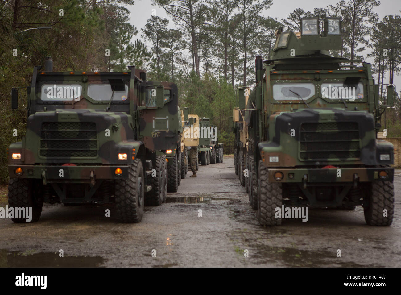 Marines conduct convoy operations in support of simulated foreign ...
