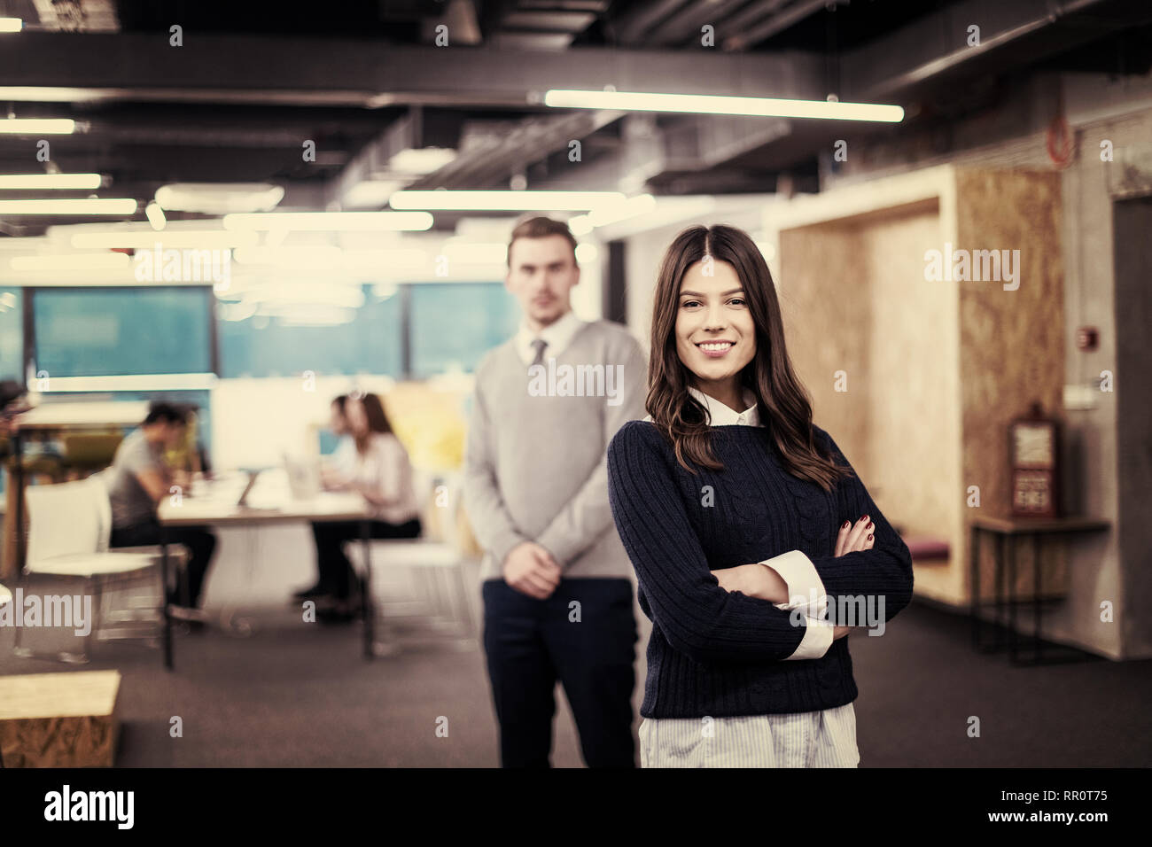 Portrait Of Successful Business couple Entrepreneur At Busy startup ...