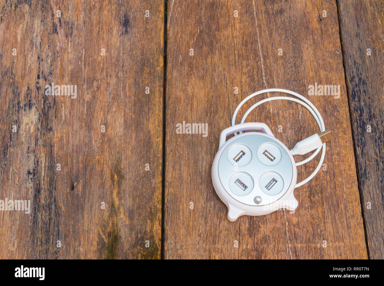 usb hub port white box and Cable channel on wooden vintage background ...