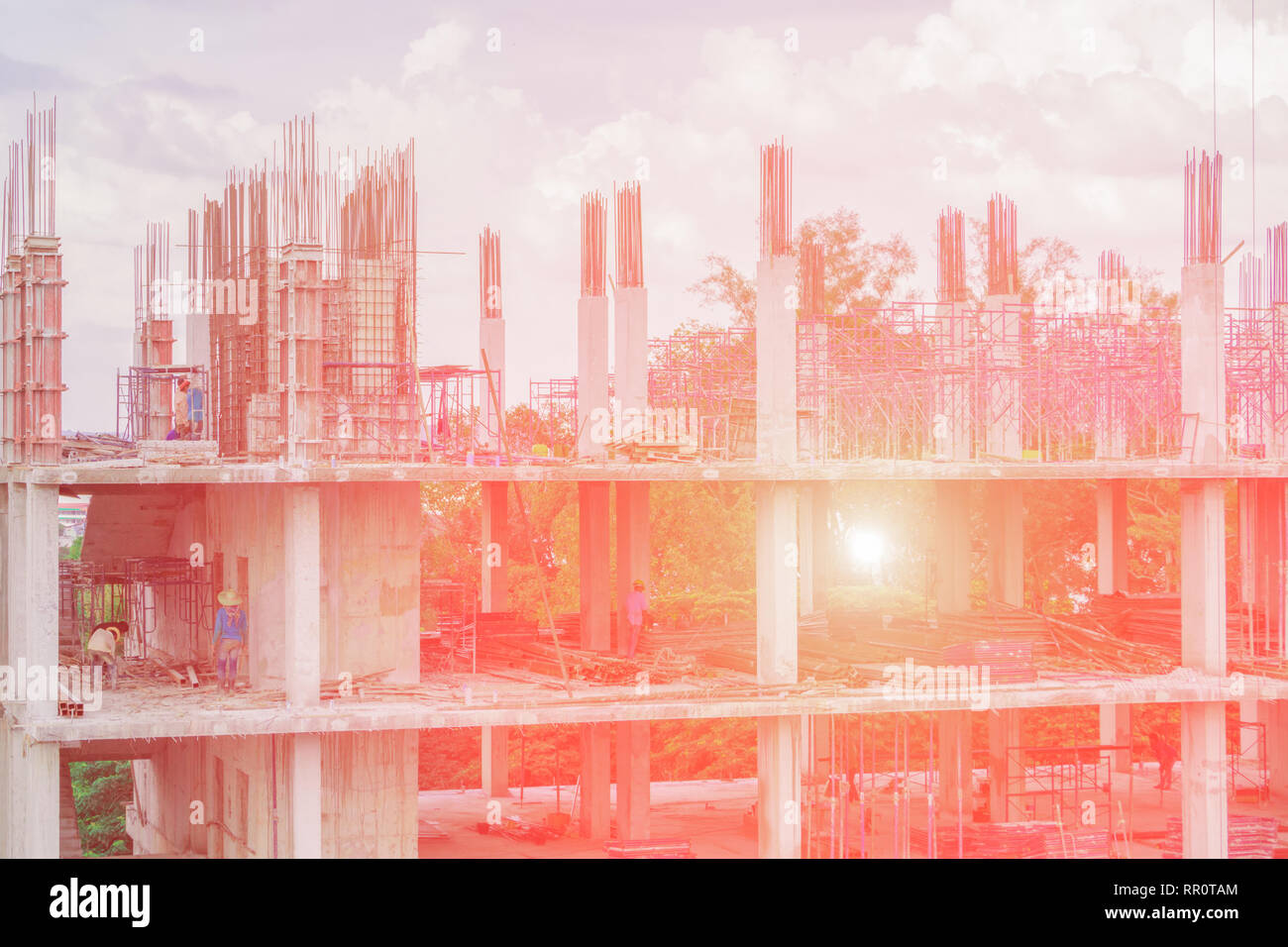 construction work in building site workplace with worker and sunrise ...