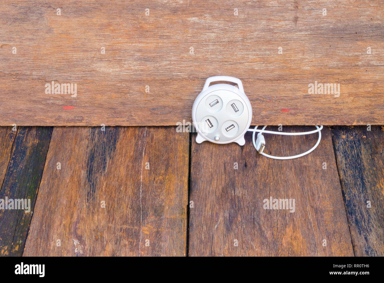 usb hub port white box and Cable channel on wooden vintage background ...