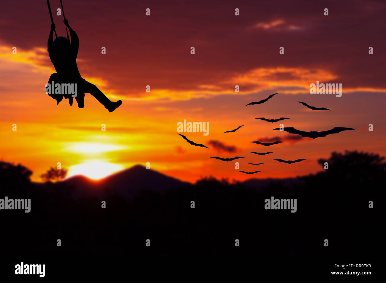 soldier silhouette parachute with a bat Vampire flying red sky on ...