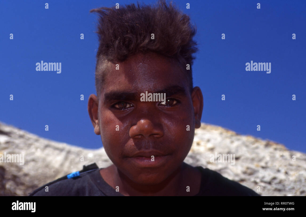 TEENAGE ABORIGINAL BOY, YUELAMU ABORIGINAL COMMUNITY (MOUNT ALLAN ...