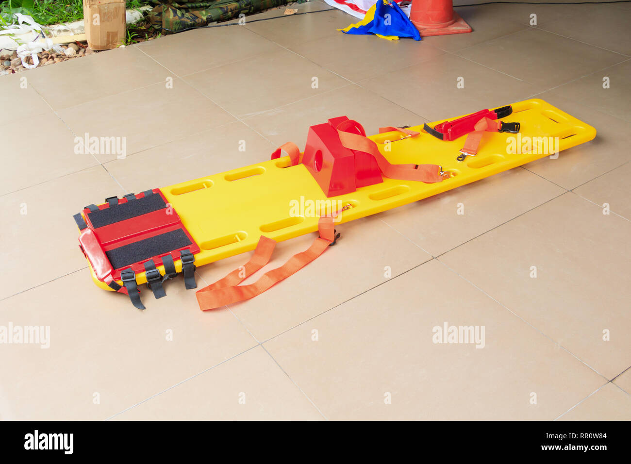 stretcher for emergency paramedic service EMS medical equipment on tile ...