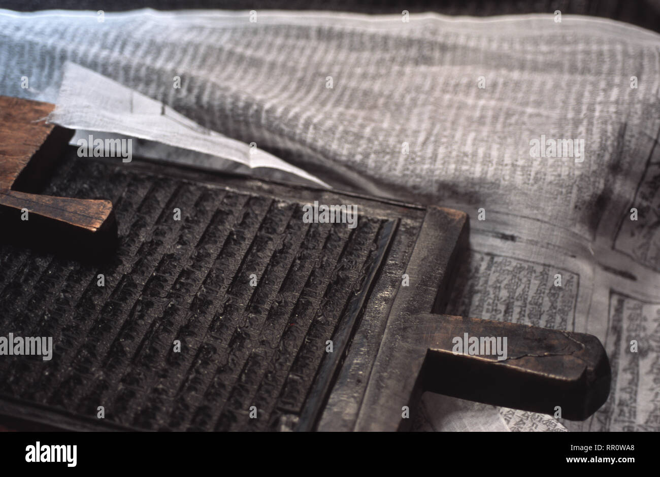 Caption: Dege, Sichuan, China - Apr 2001. Printing blocks hand-carved ...
