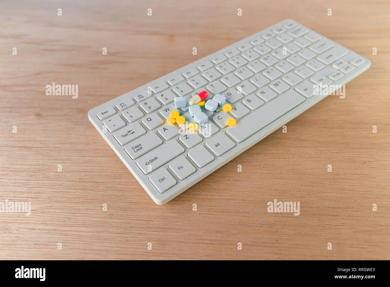 pills and capsule On computer keyboard Concept with copy space add text ...