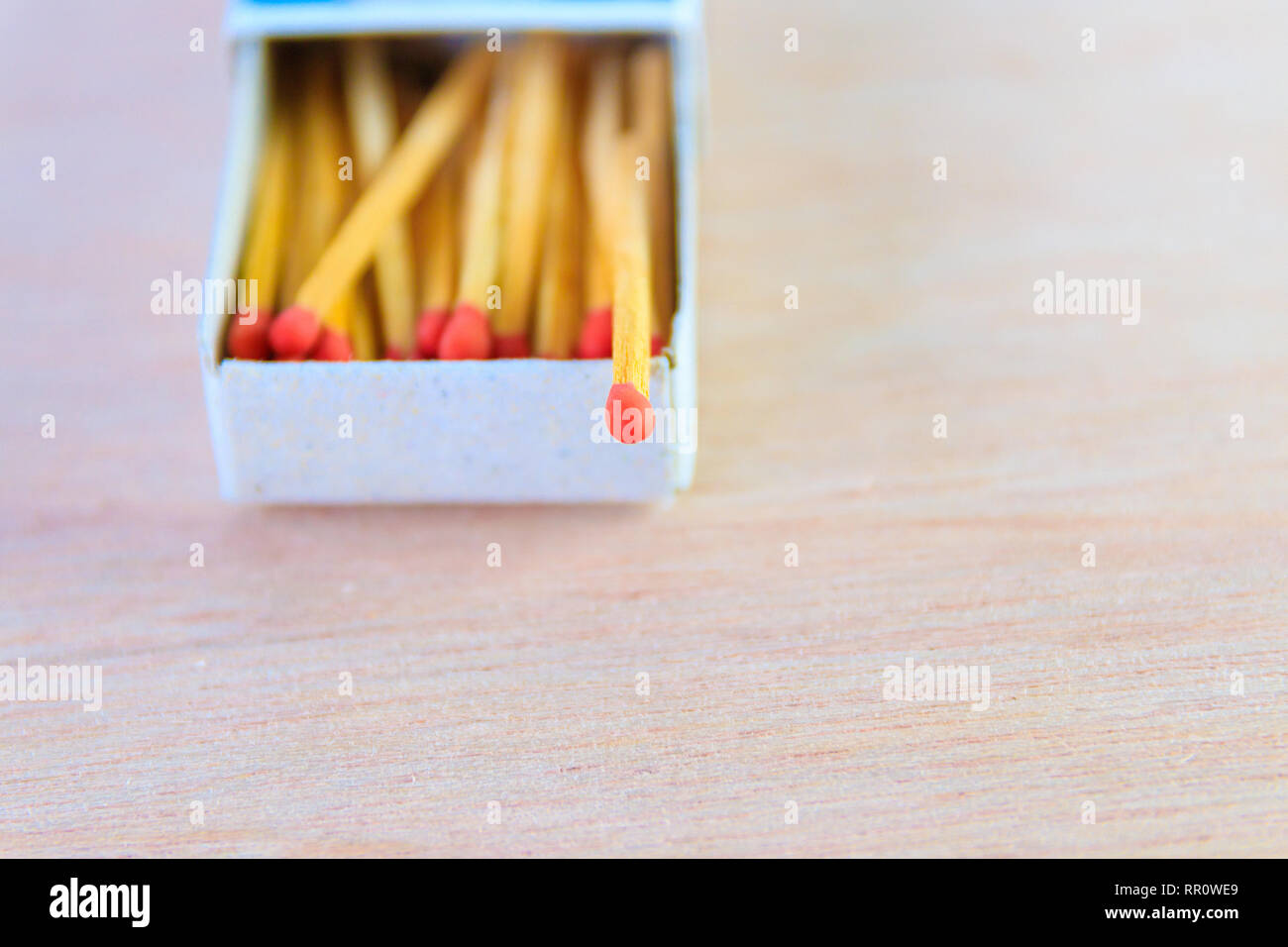 match stick in box with red head concept energy old vintage on wooden ...