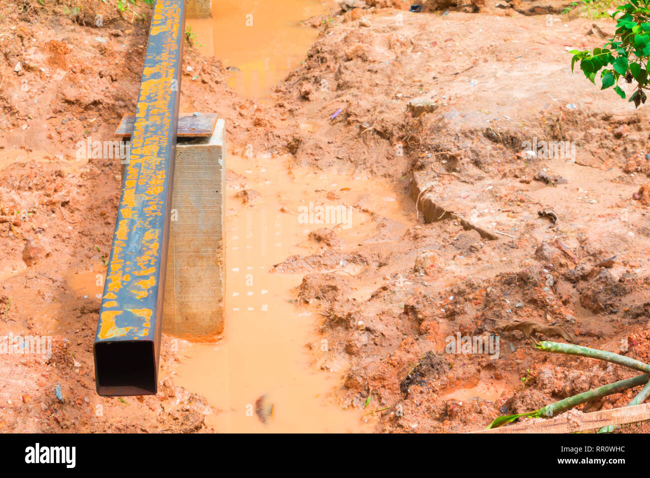steel post on cement pillar in construction work site Stock Photo - Alamy