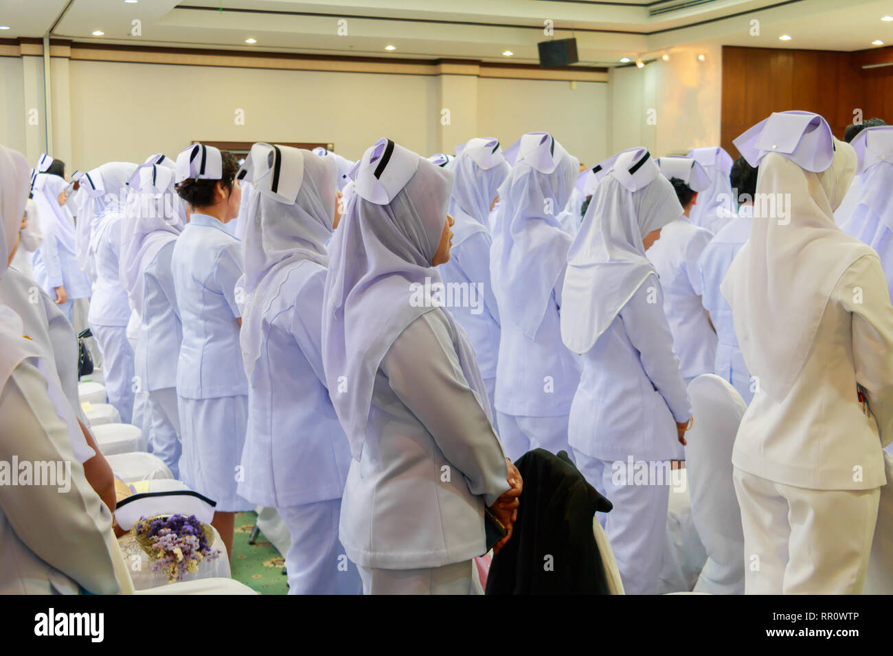 Moslem nurses Stand in room meeting seminar and presentation in ...