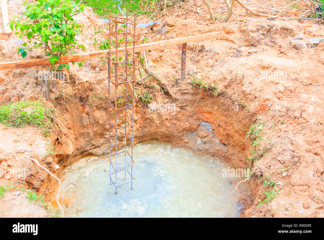 post metal in Hole of foundation construction building site making with ...