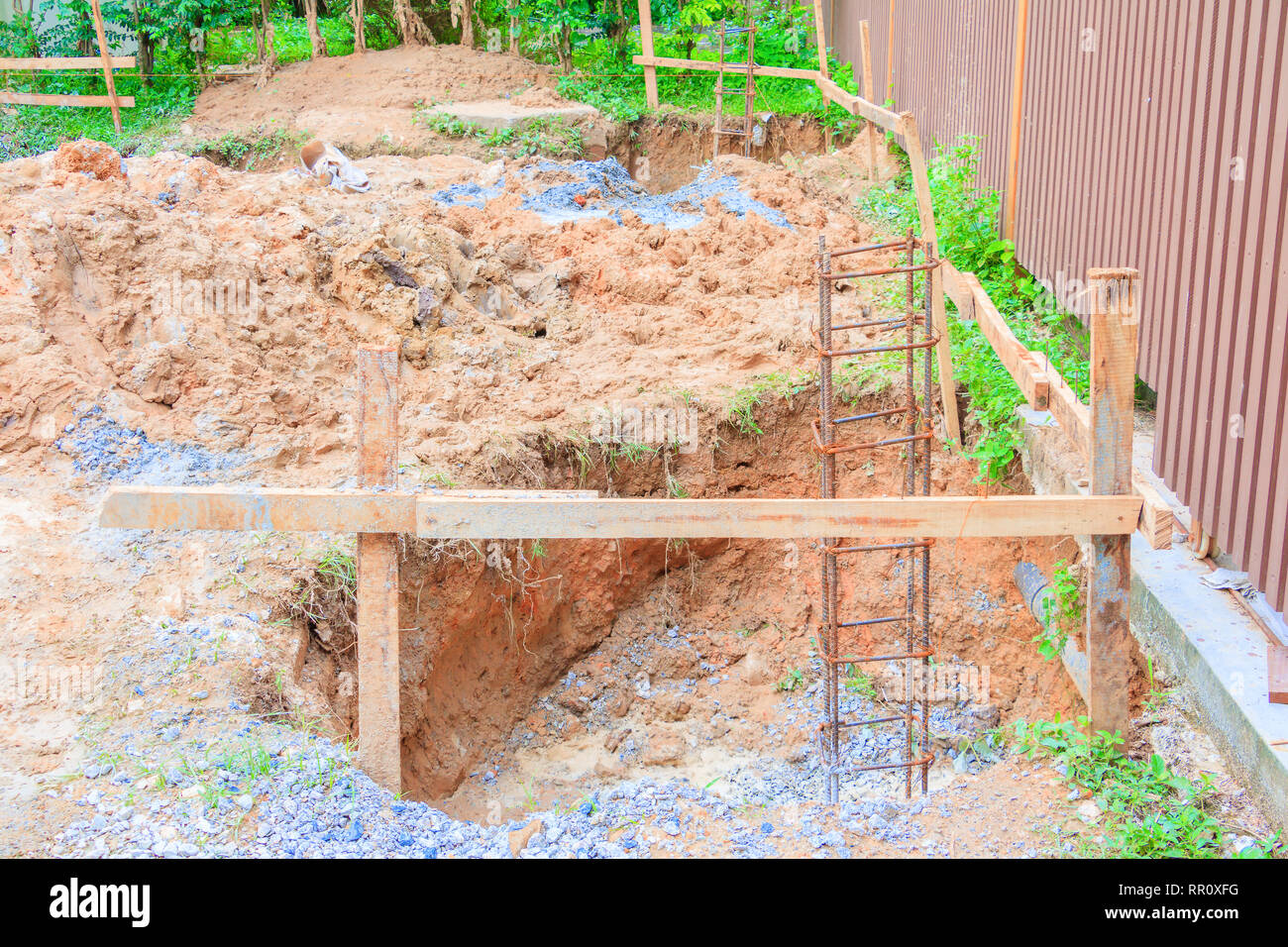 post metal in Hole of foundation construction building site making with ...