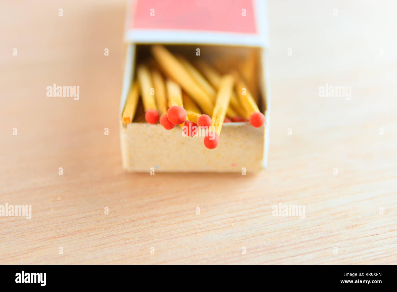 match stick in box with red head concept energy old vintage on wooden ...