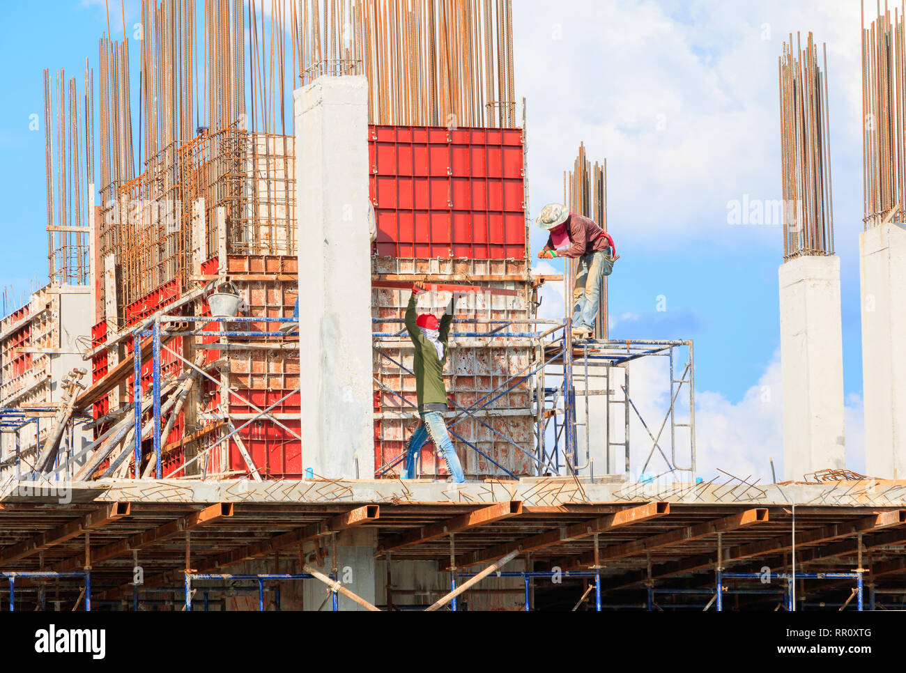 construction workers site and building of housing at laborer work ...