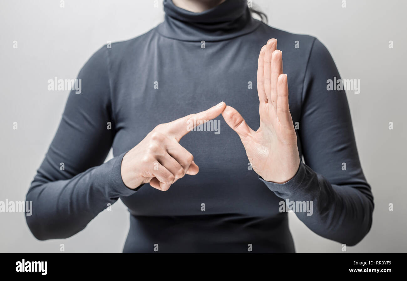 Woman speaks sign language deaf people Stock Photo - Alamy