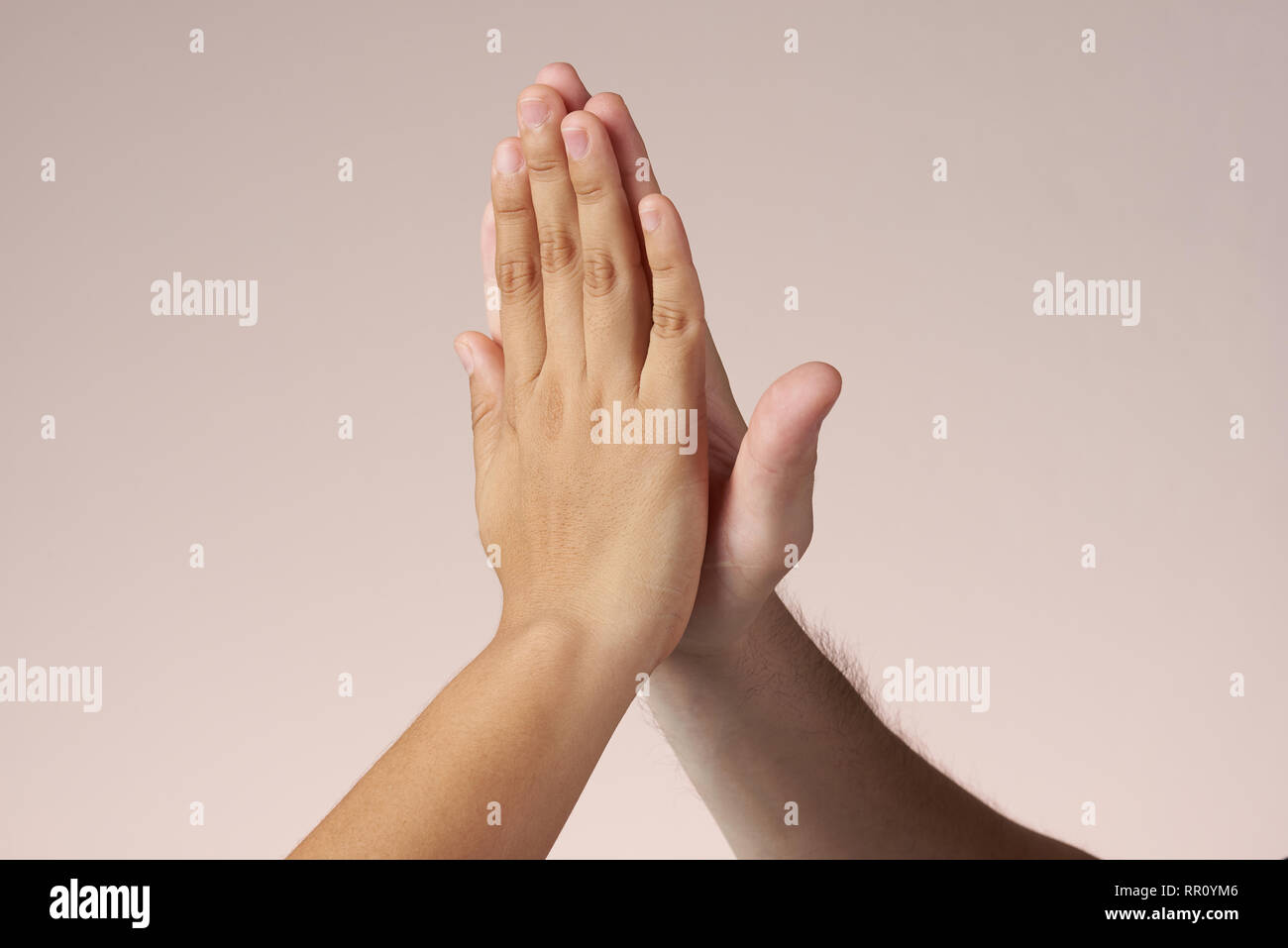 Hands doing hi-five. success and achievement concept. Teamwork Stock ...