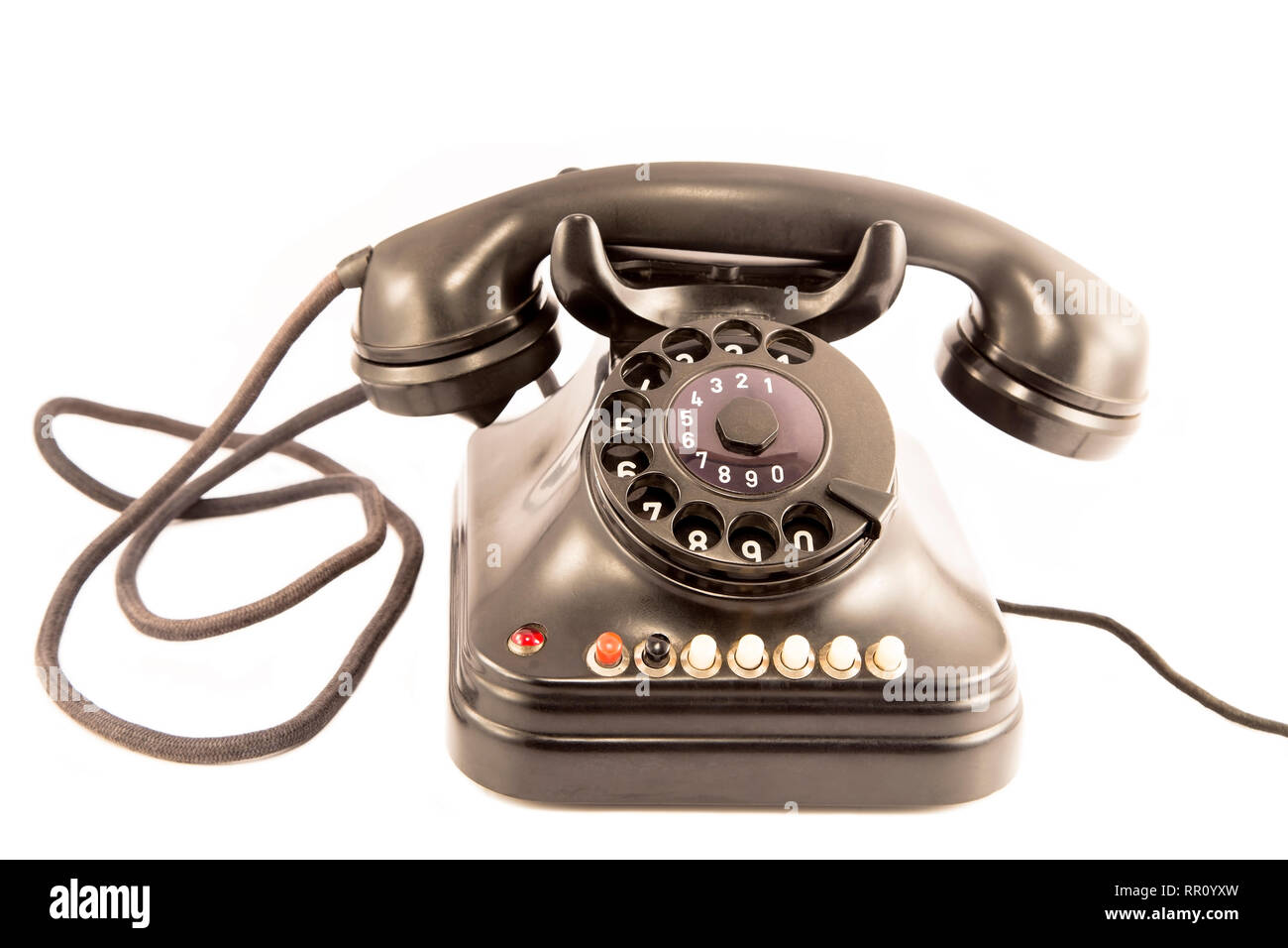 Old telephone isolated on white background Stock Photo - Alamy