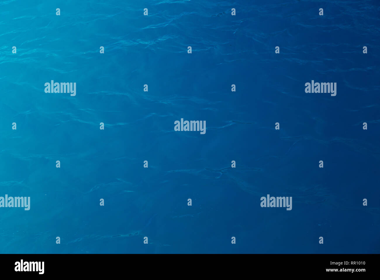 Deep blue sea water background Stock Photo - Alamy