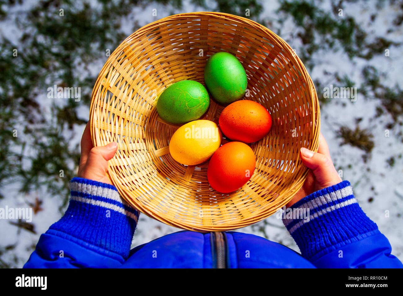 Young boy holding an easter egg basket isolated Stock Photo - Alamy