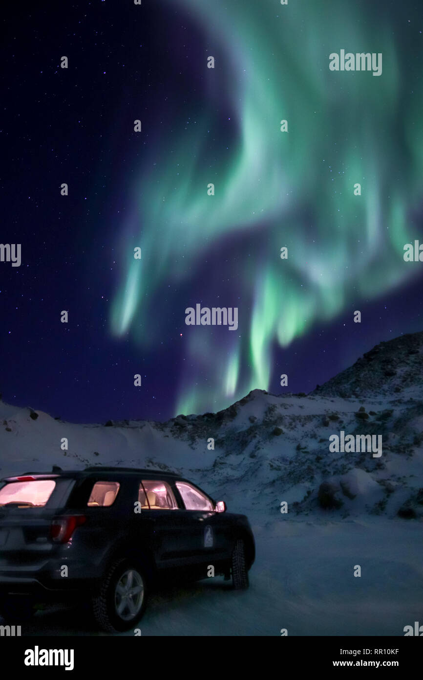 Aurora Borealis viewed from the outskirts of the remote Inuit town of ...