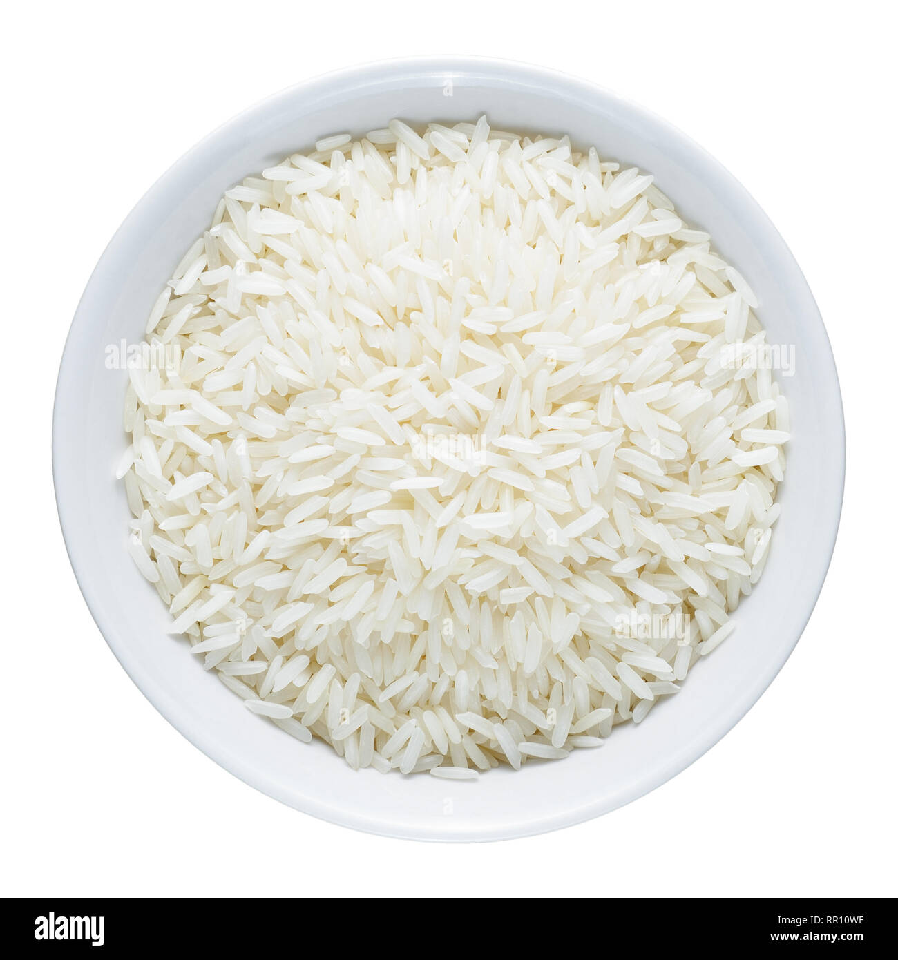 Rice in bowl isolated on white background Stock Photo - Alamy