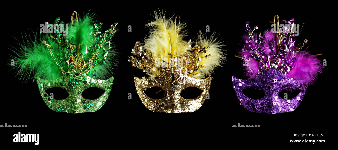 Colorful Mardi Gras masks isolated on black Stock Photo - Alamy