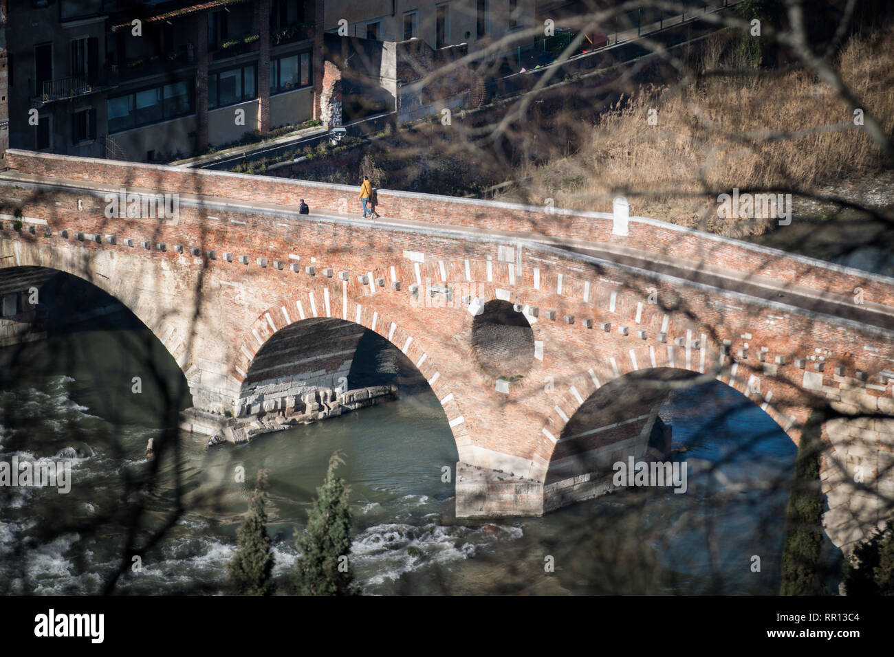 Detail of stone bridge, the famous Roman bridge that crosses the Adige ...