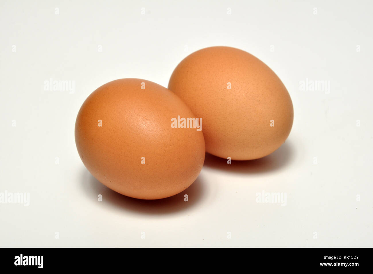 Two Egg White Background Stock Photo - Alamy