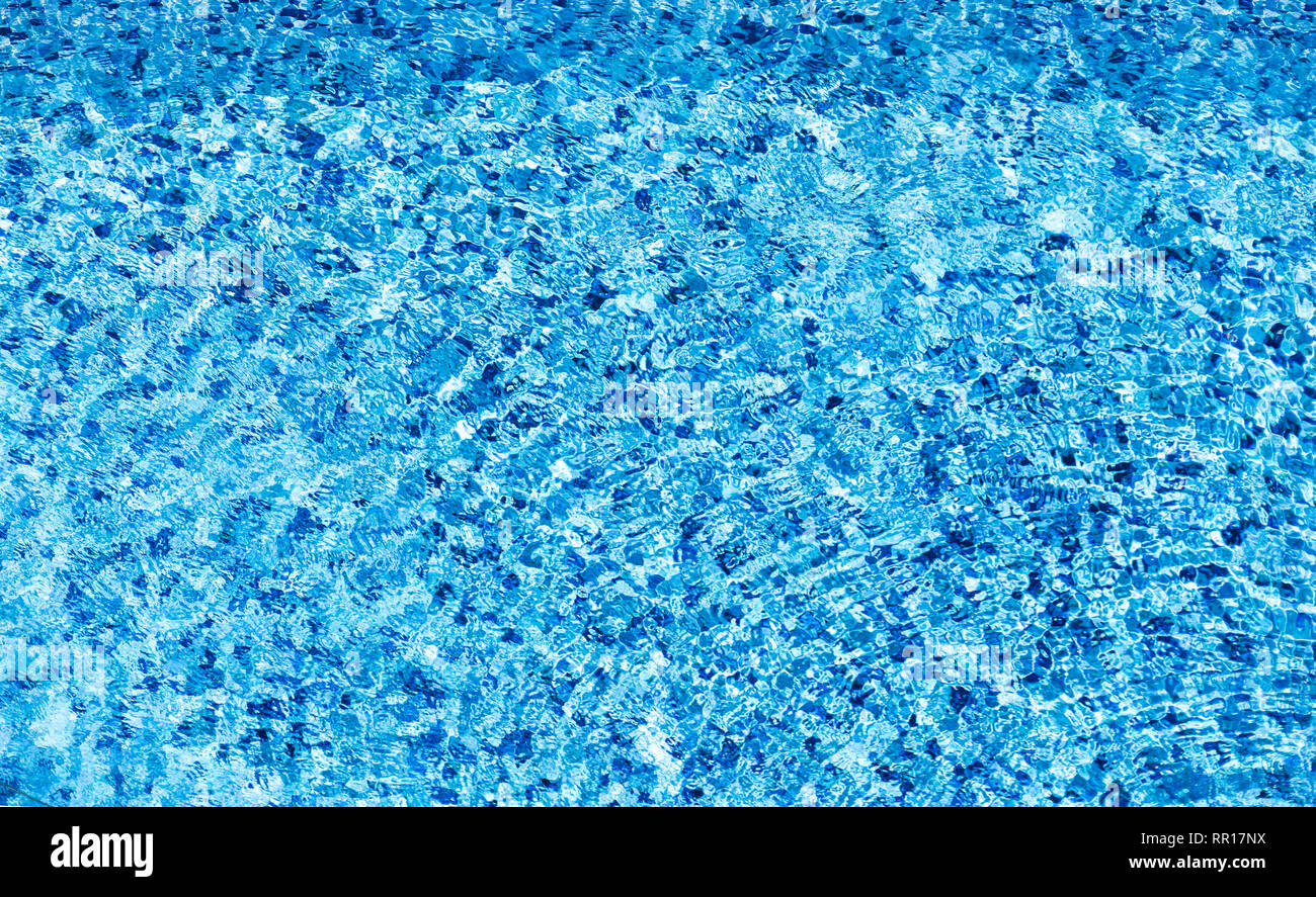 Blue pool water top view, background photo texture Stock Photo - Alamy