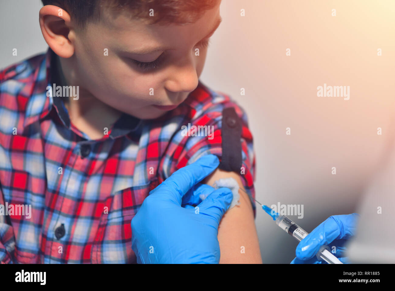 Close-up hands doctor or nurses are vaccination to patient using the ...
