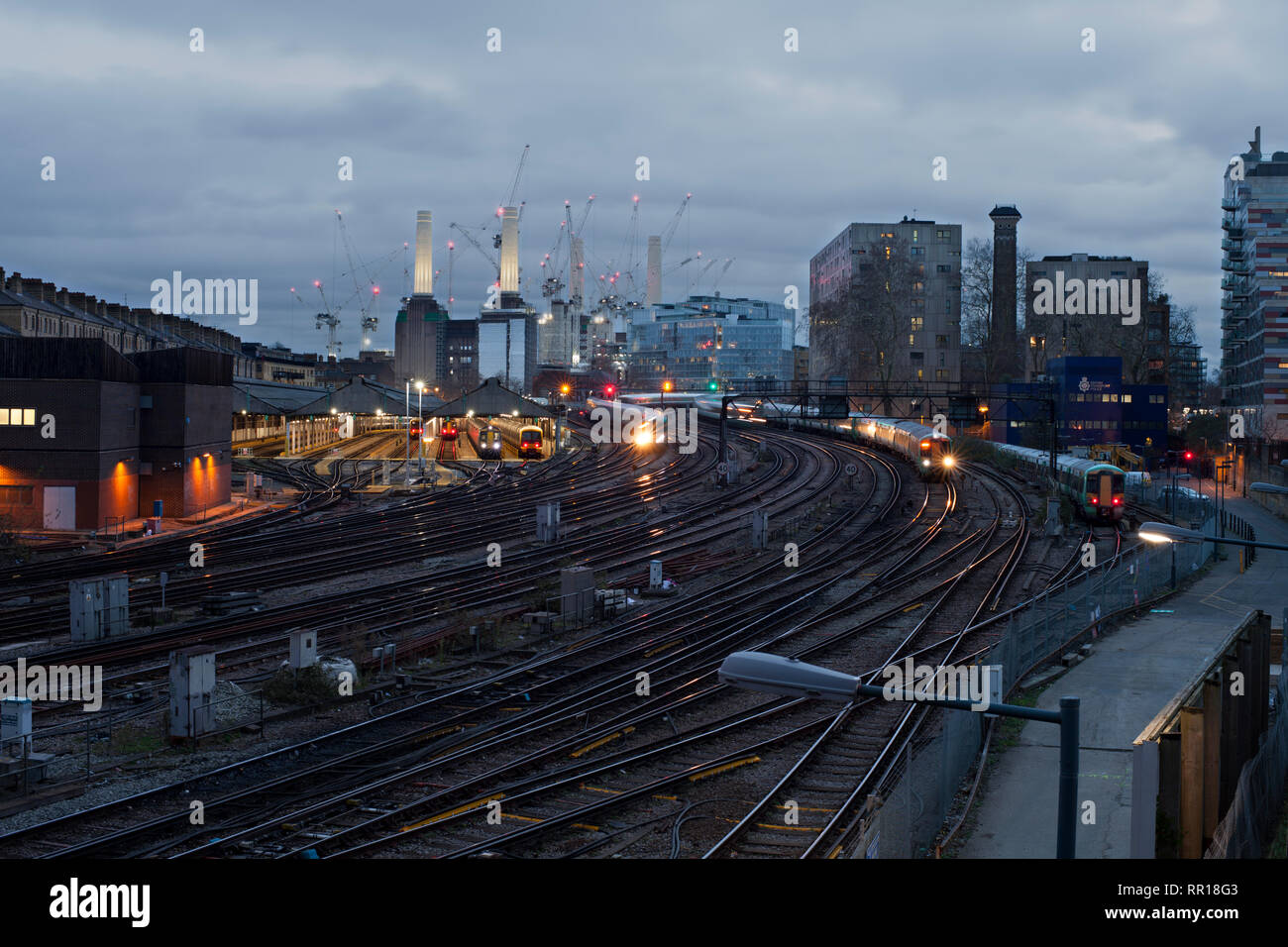 Govia Thameslink southern trains arriving at London Victoria at dusk ...