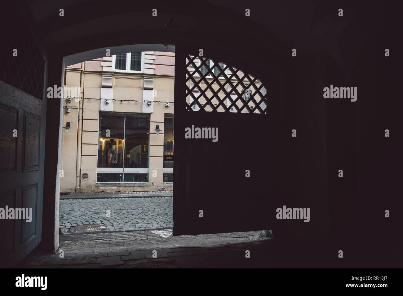 Vilnius old town street arc hi-res stock photography and images - Alamy